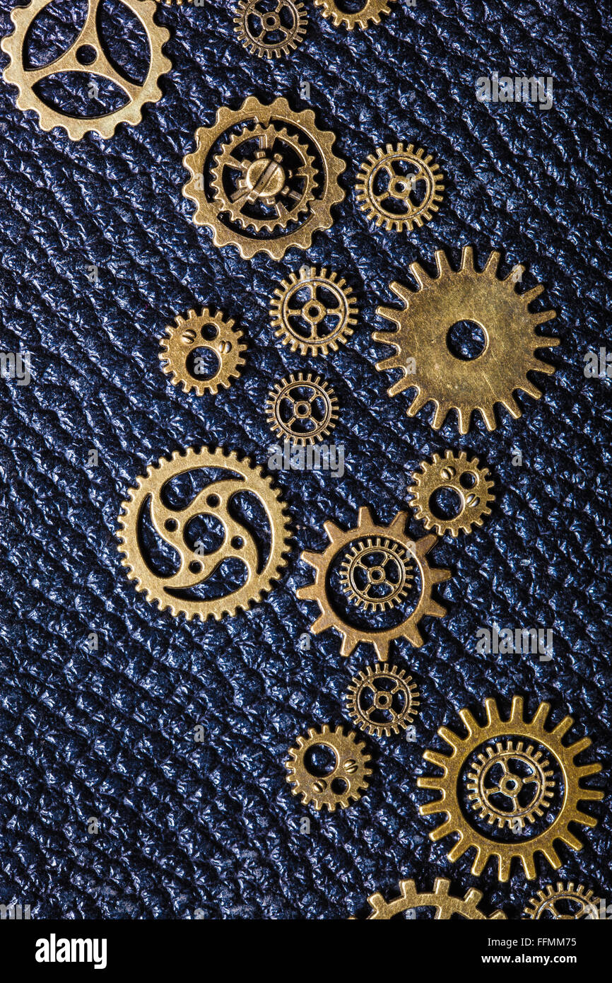 steampunk mechanical cogs gears wheels on leathern background Stock ...