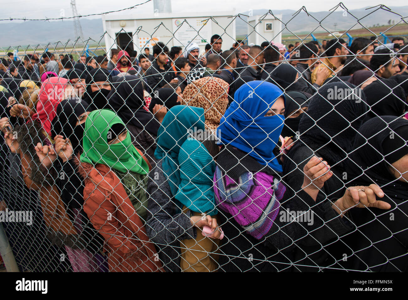 blanket distribution by a Muslim NGO to refugees in Ashdi refugee camp ...