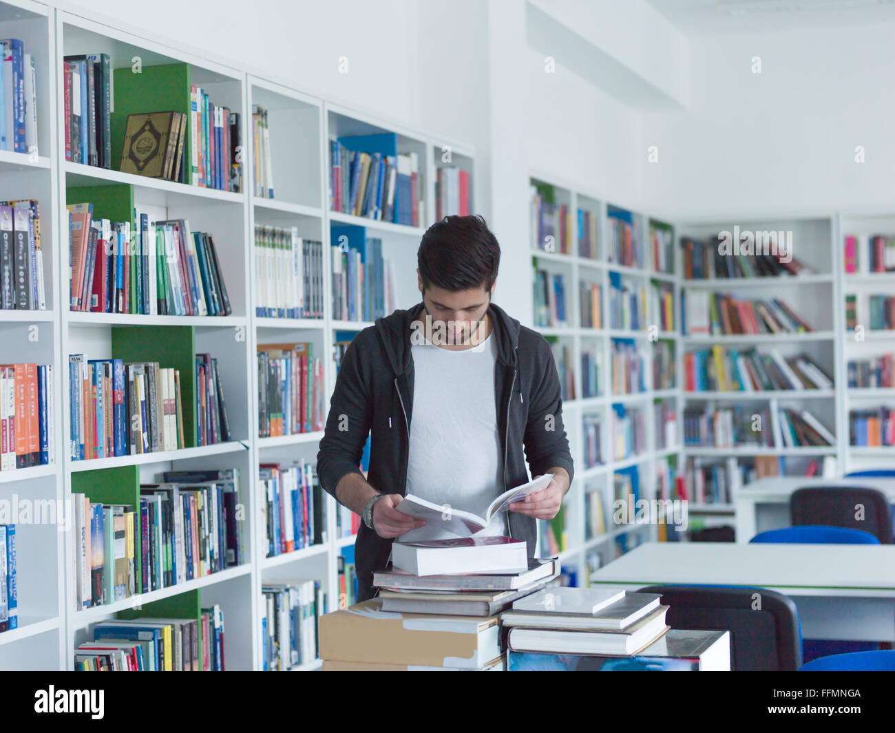 portrait of student in collage school library, arab youth learning and ...