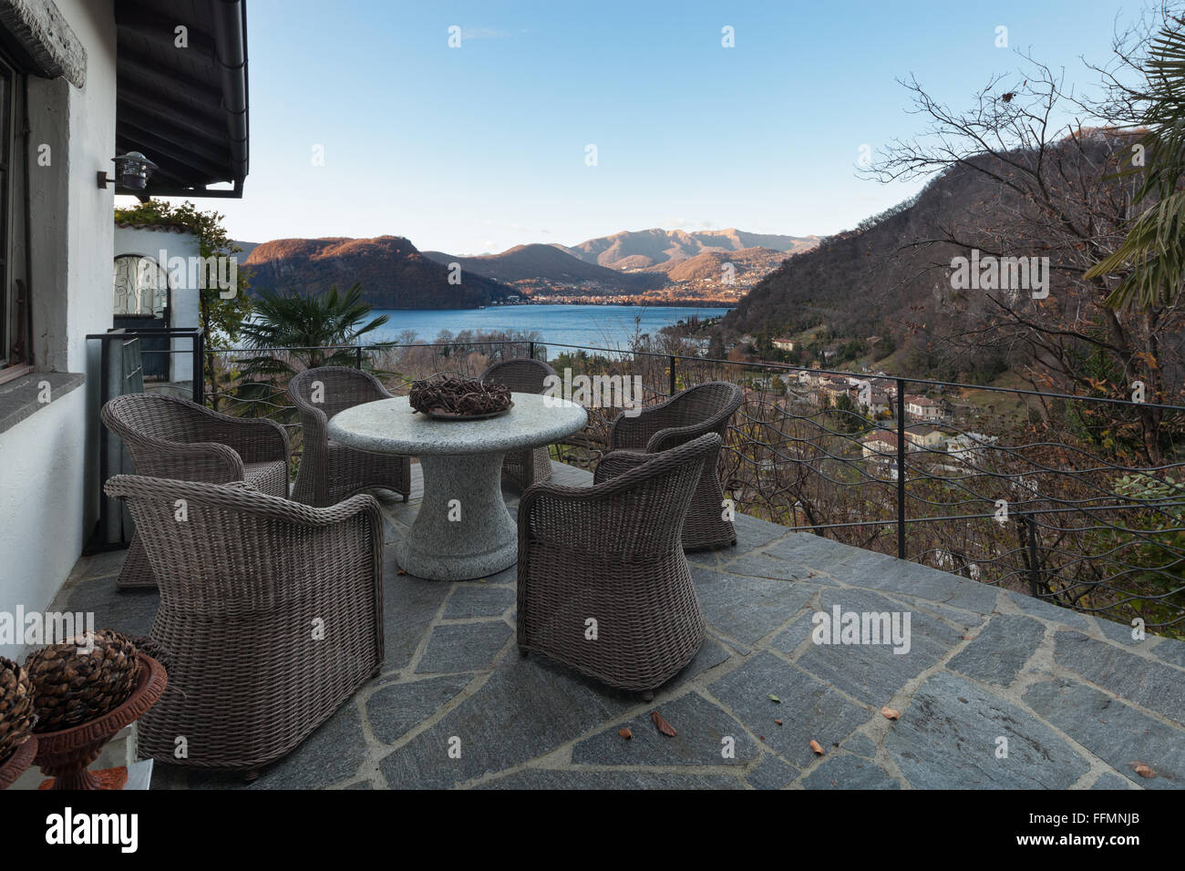 House, nice terrace with garden furniture, flooring stone Stock Photo ...