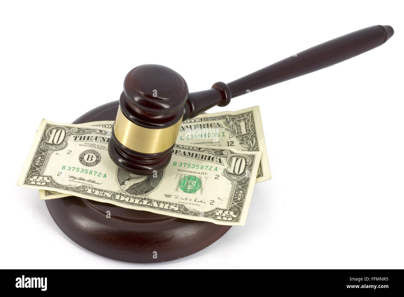 Wooden gavel and money Stock Photo - Alamy
