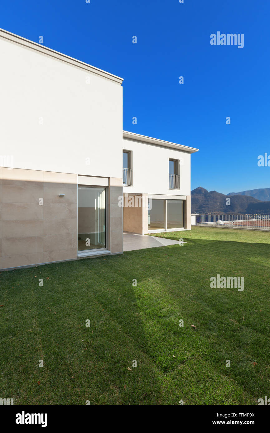 Exterior of a modern building, view from the garden Stock Photo - Alamy