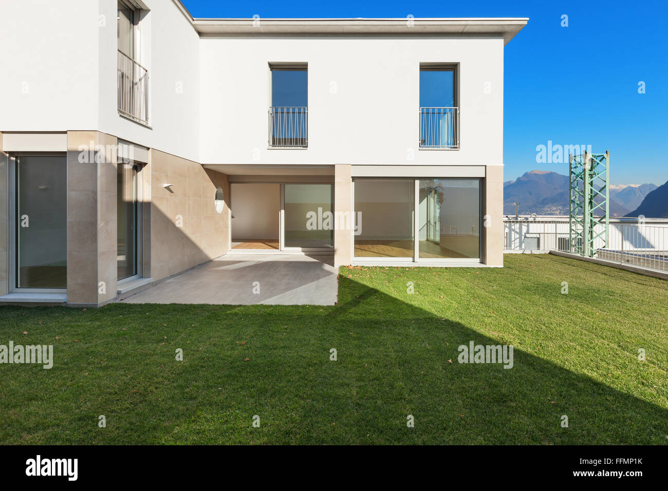 Exterior of a modern building, view from the garden Stock Photo - Alamy