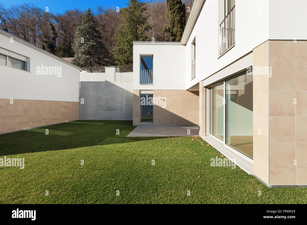 Exterior of a modern building, view from the garden Stock Photo - Alamy