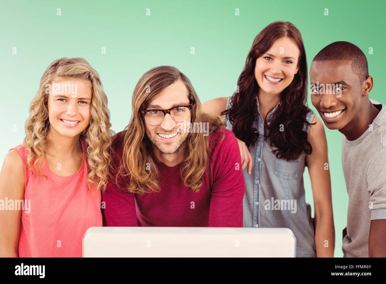 Composite image of portrait of smiling business team standing at ...