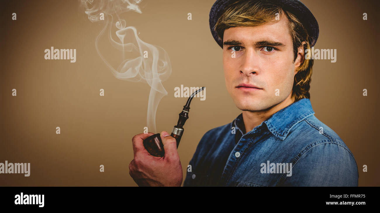 Holding pipe hi-res stock photography and images - Alamy