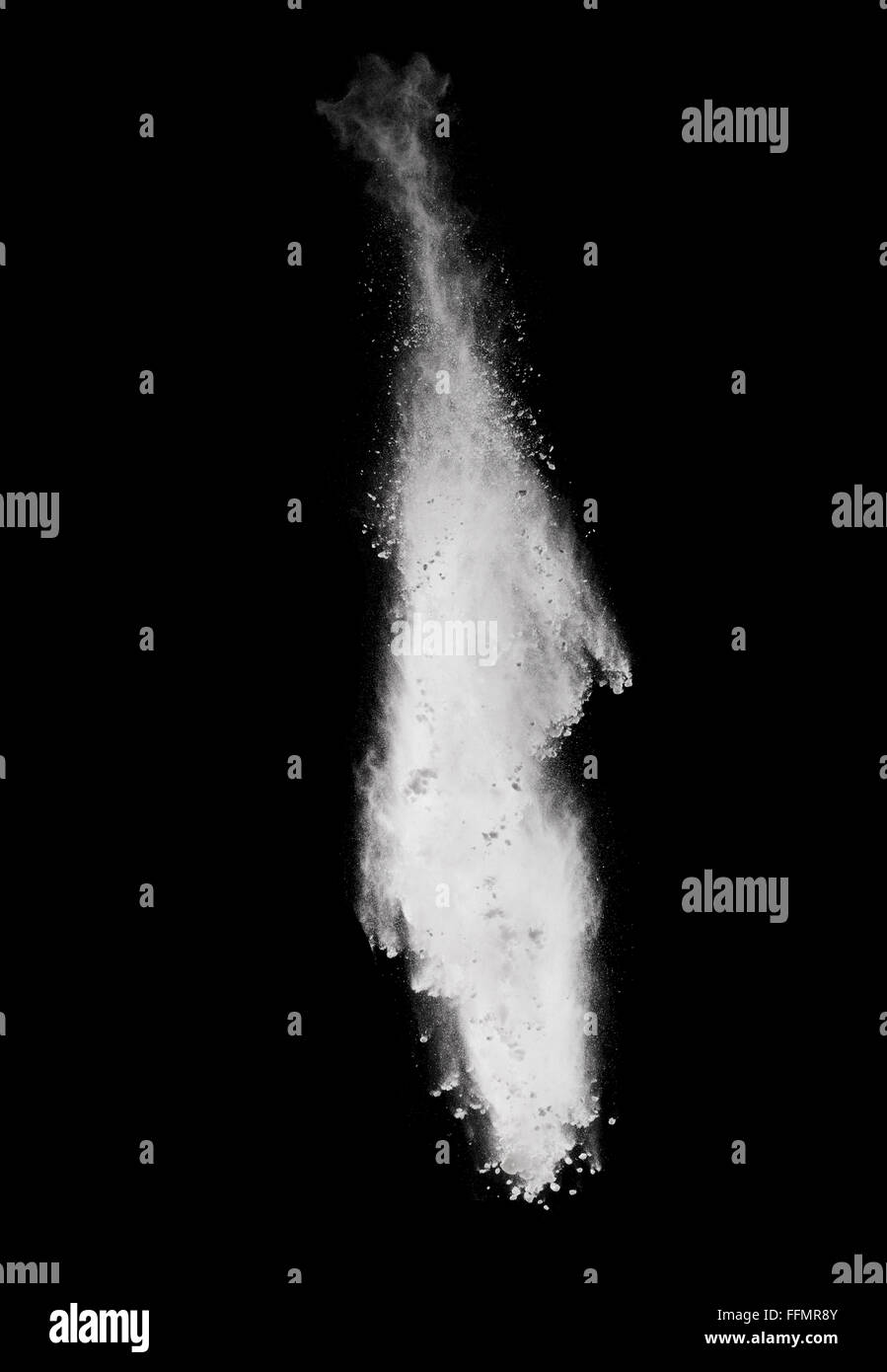 White powder explosion isolated on black background Stock Photo - Alamy