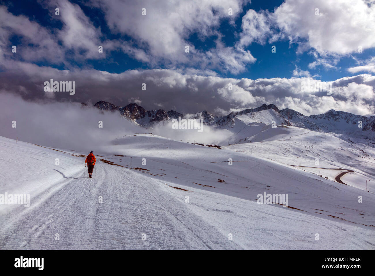 Female walker hiker in Pyrenees mountains in clouds Stock Photo - Alamy