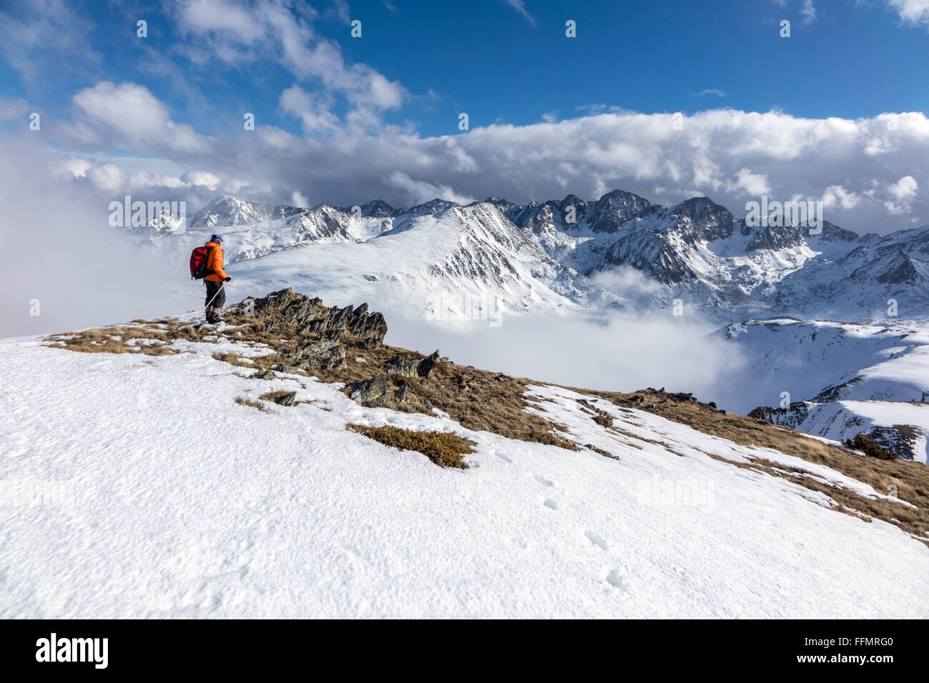 Female walker hiker in Pyrenees mountains in clouds Stock Photo - Alamy