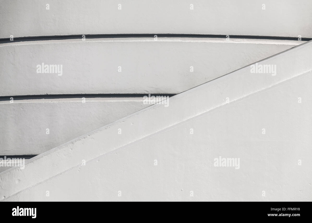 White wall with regular shapes, background or texture Stock Photo - Alamy