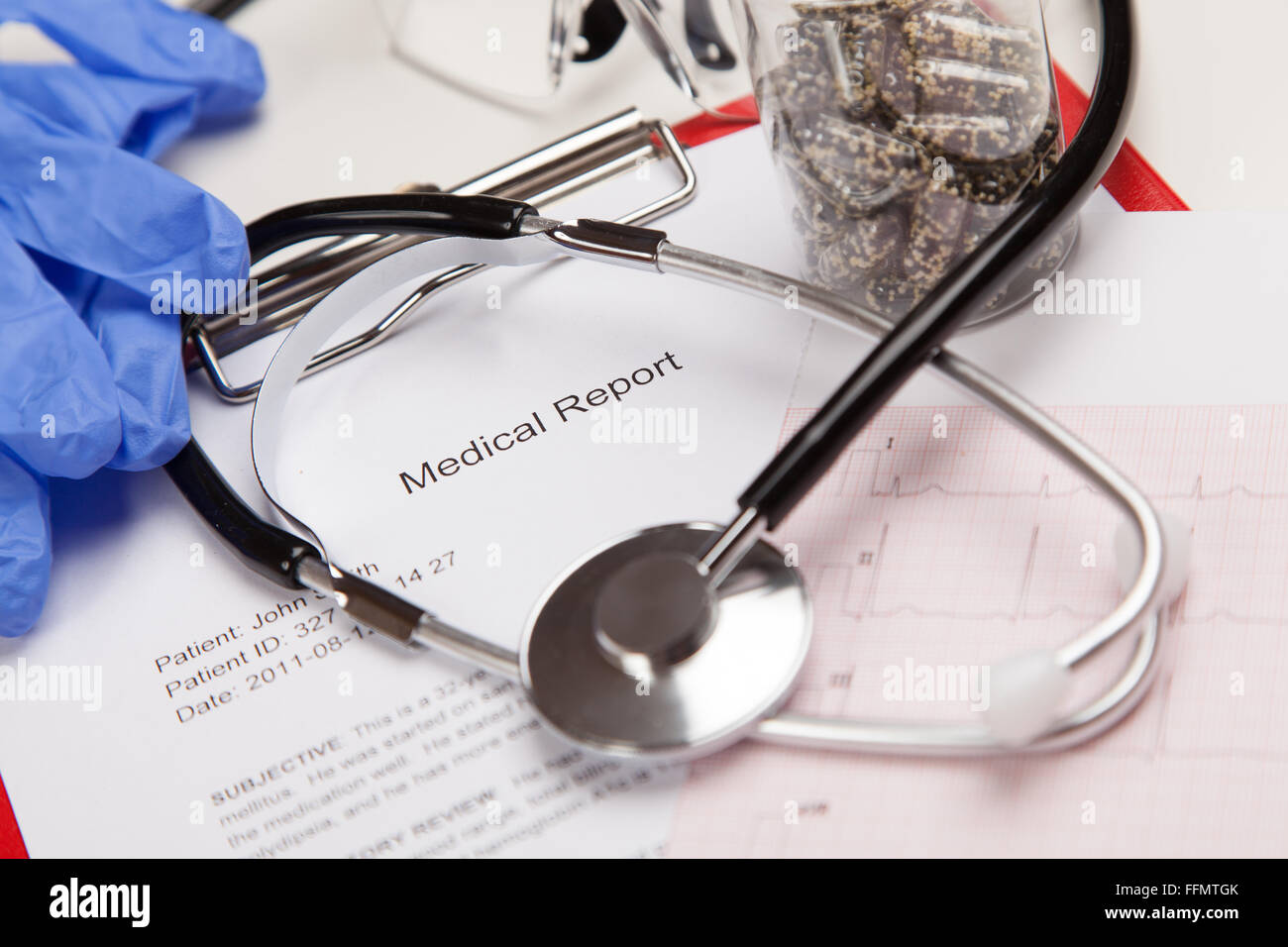 Medical report and cardiogram Stock Photo - Alamy