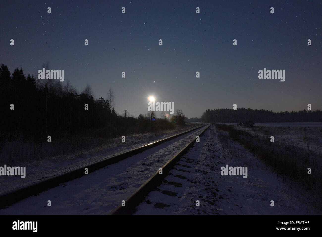 Railway in the moonlight Stock Photo - Alamy