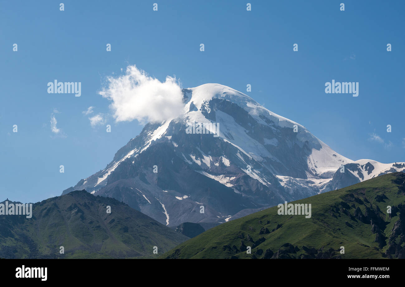 5047 m Mount Kazbek (Kazbegis Mkinvartsveri) in Khokh Range in Caucasus ...
