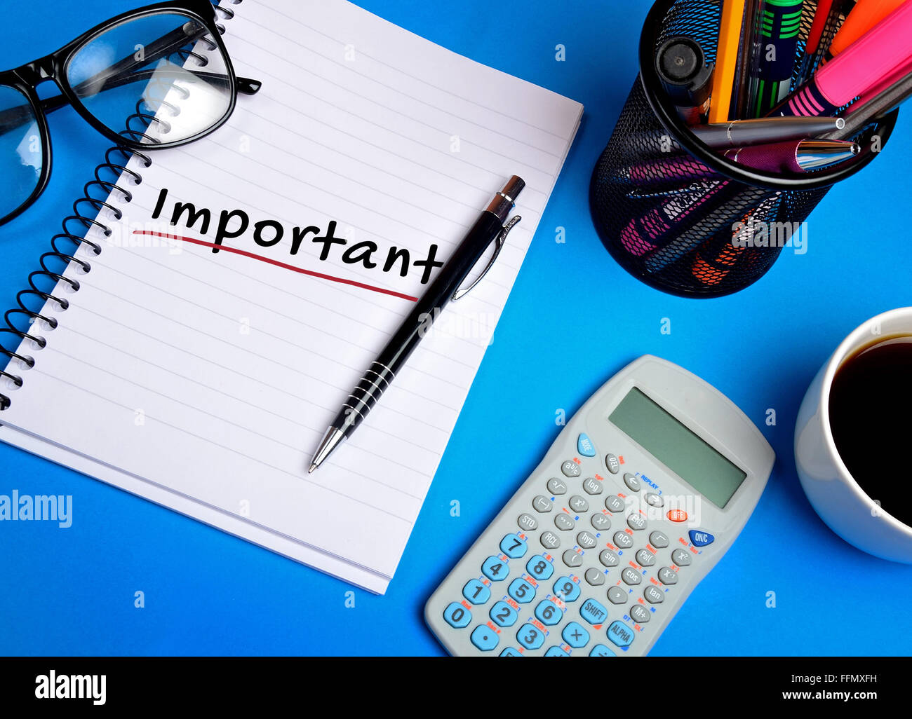 Important word on note pad Stock Photo - Alamy