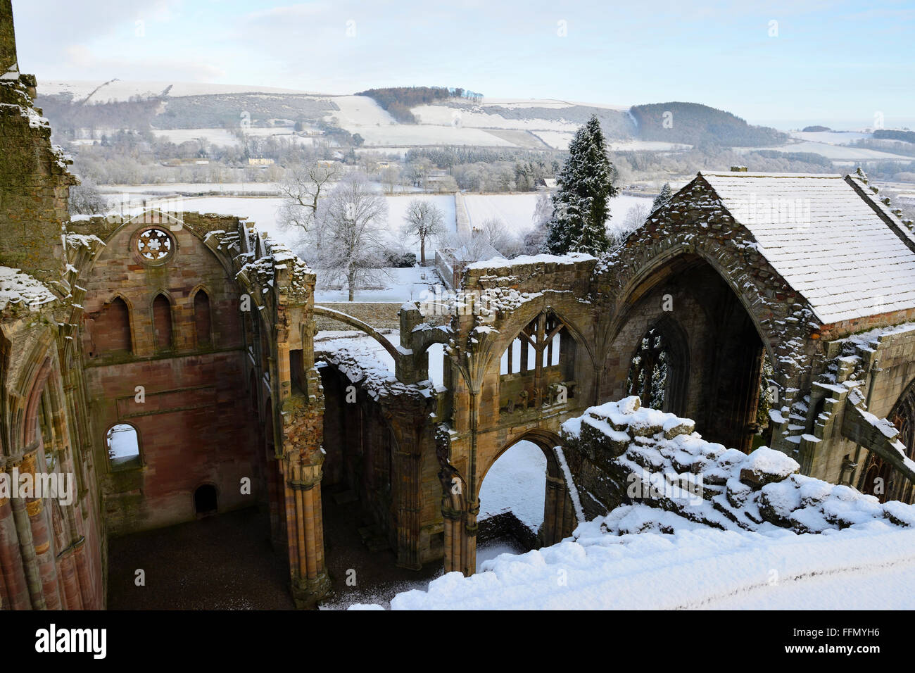 Aerial view from belfry of Melrose Abbey in snow, Scottish Borders, UK ...