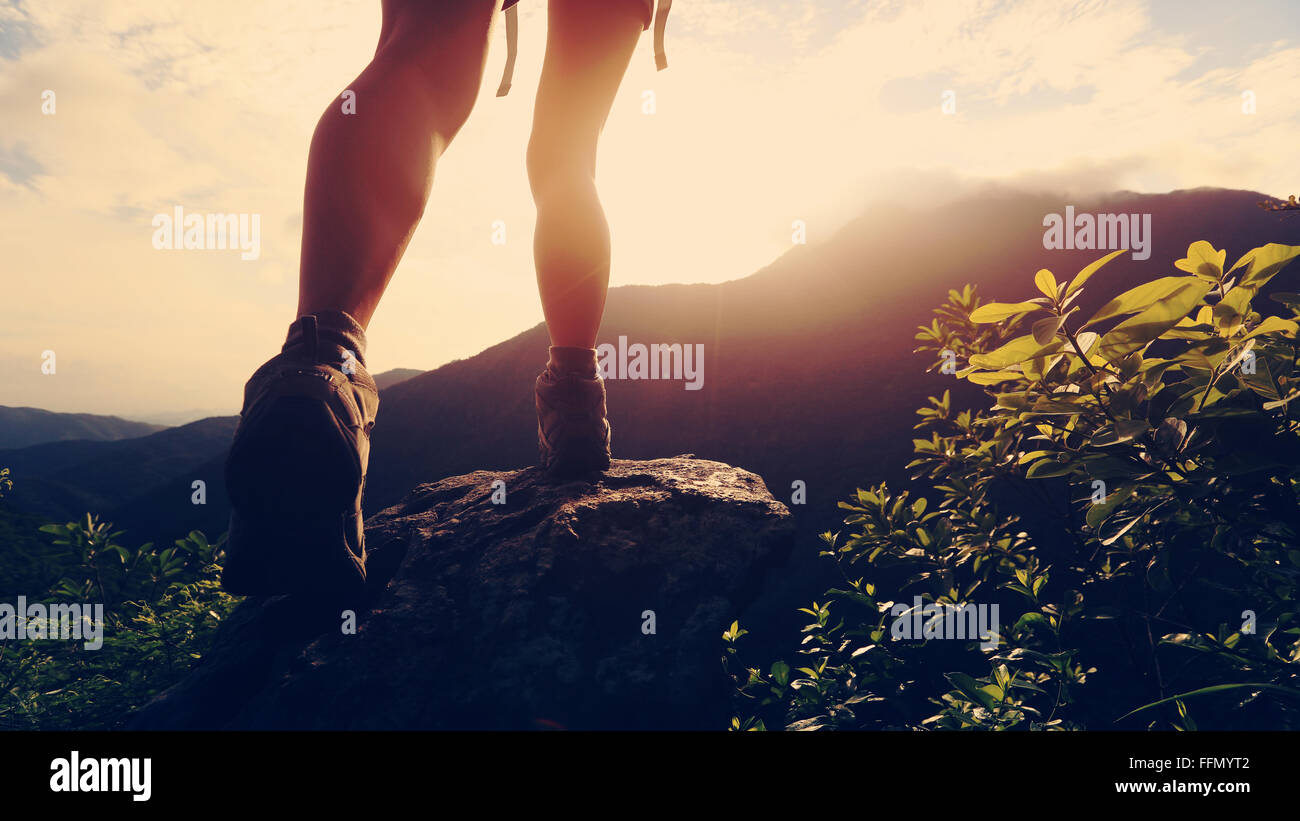 young hiker legs hiking on mountain peak Stock Photo - Alamy
