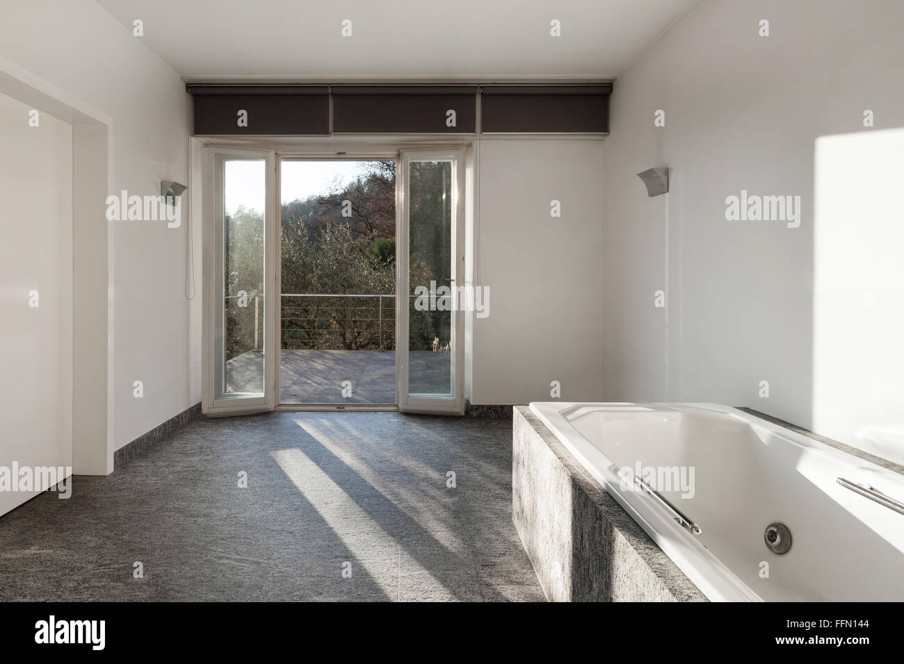 Interior, modern bathroom of an house, bathtub view Stock Photo - Alamy