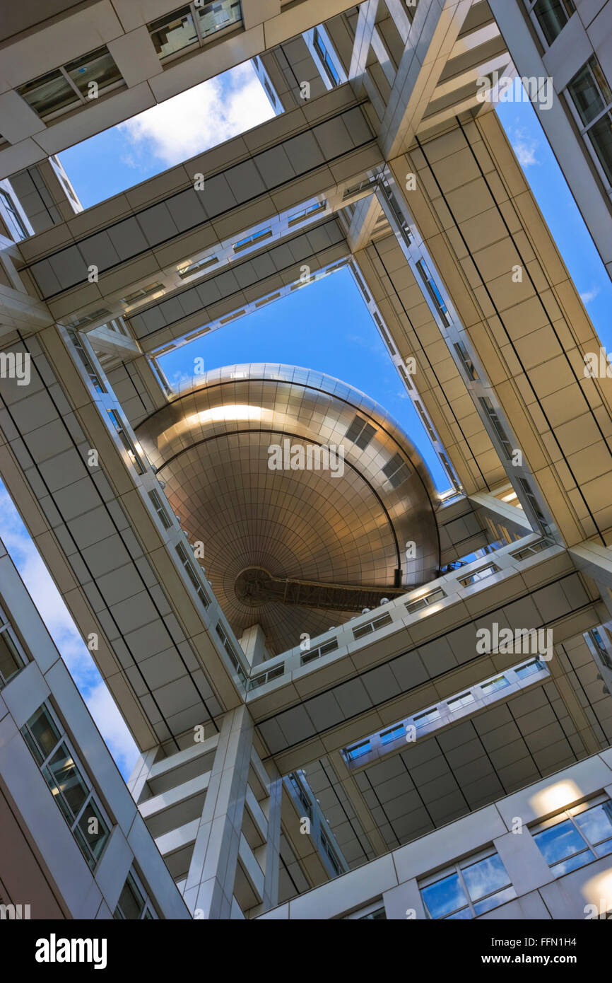 A low viewpoint looking skyward emphasizes the complex architectural ...