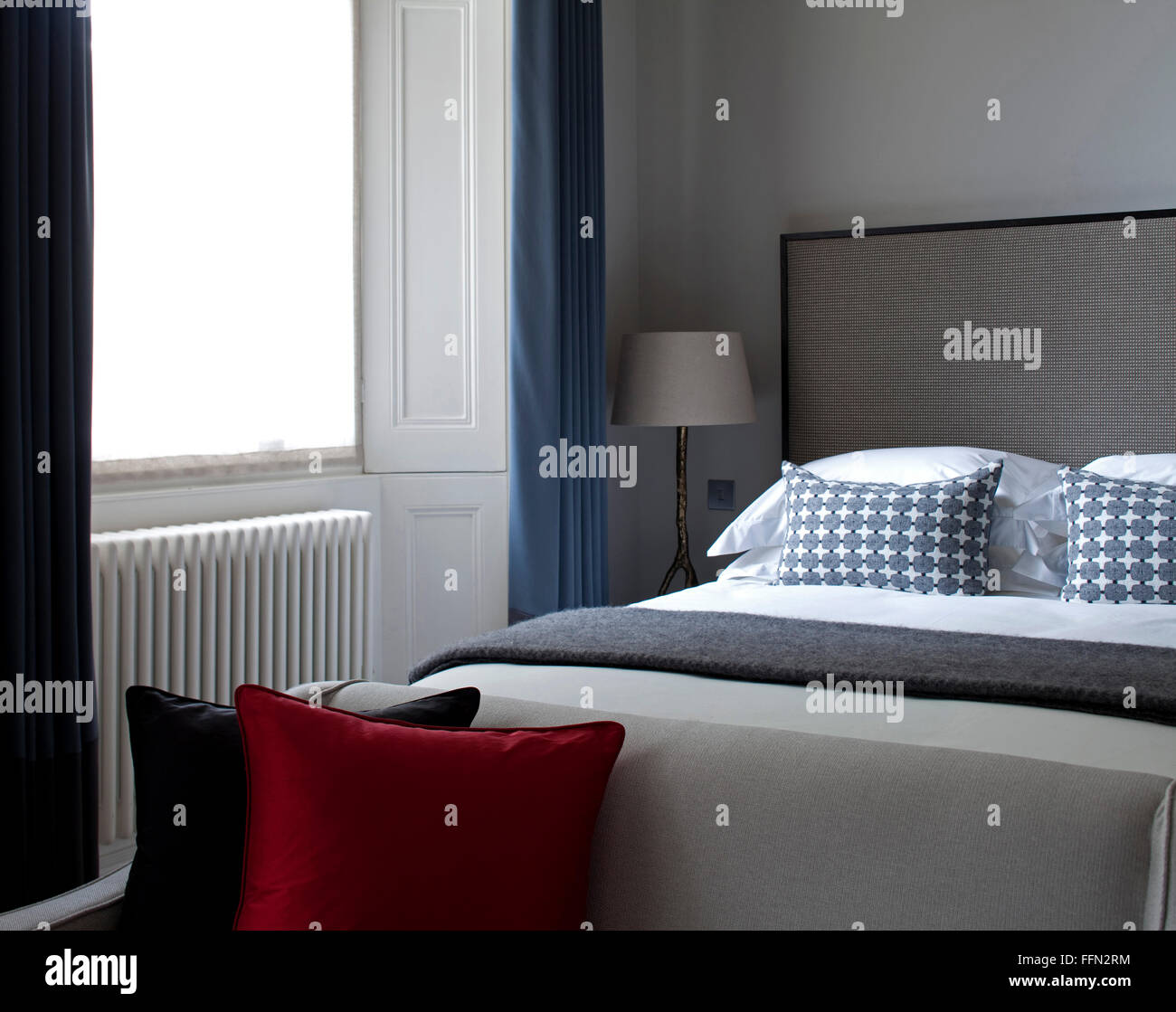 An open plan apartment with large windows overlooking the city. Modern ...