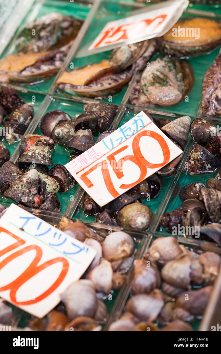 Raw seafood selling on market in Japan Stock Photo - Alamy