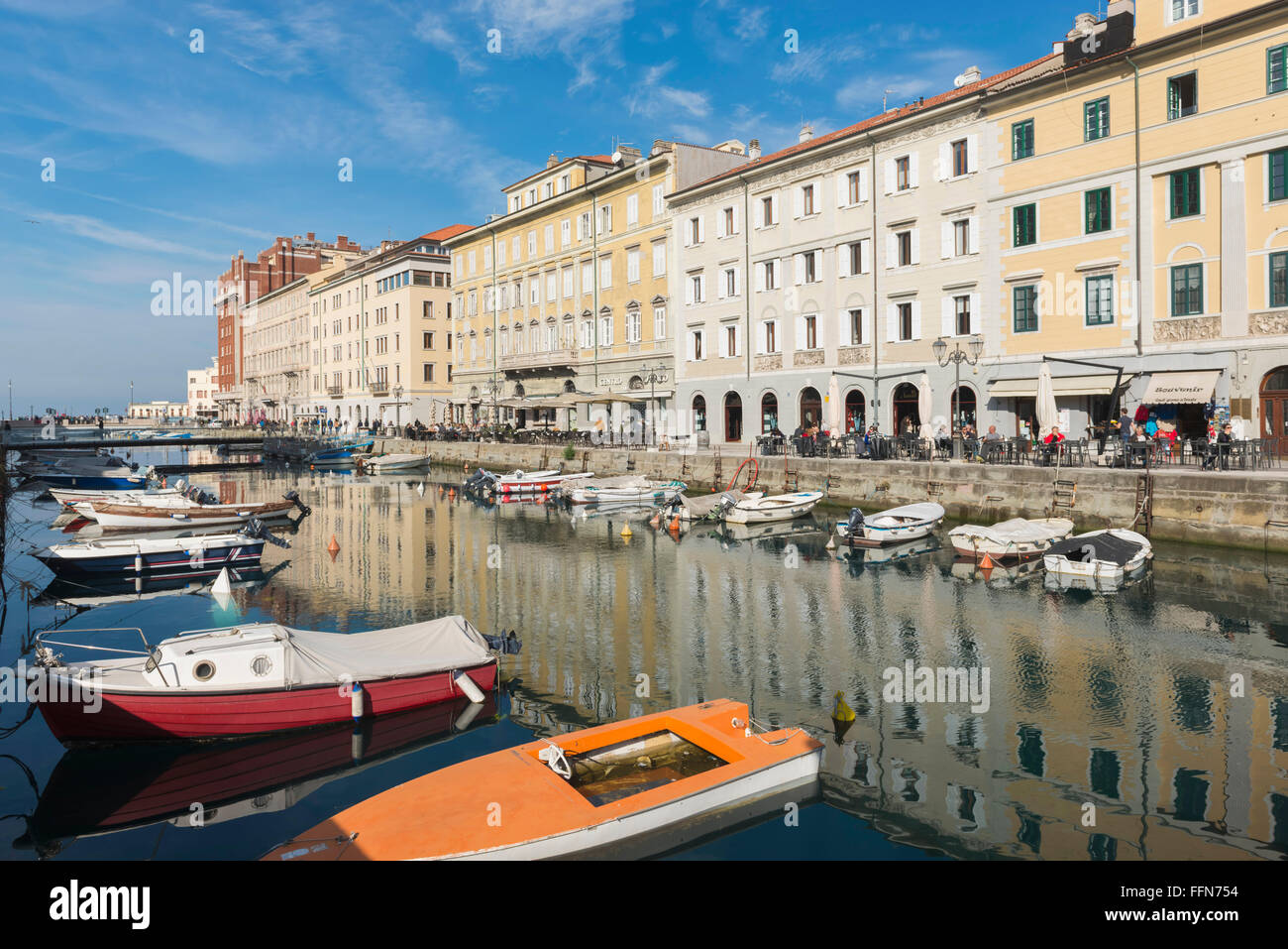Grand Canal in Trieste, Italy, Europe with boats and old buildings ...