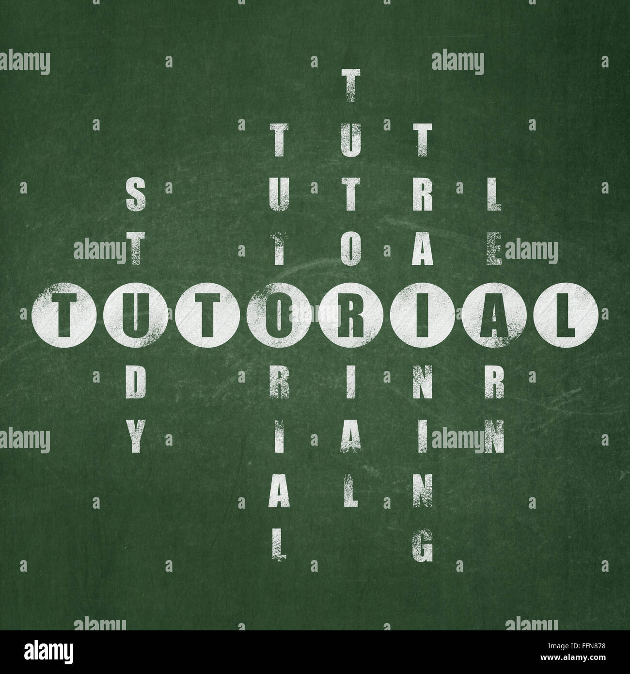 Learning concept: Tutorial in Crossword Puzzle Stock Photo - Alamy