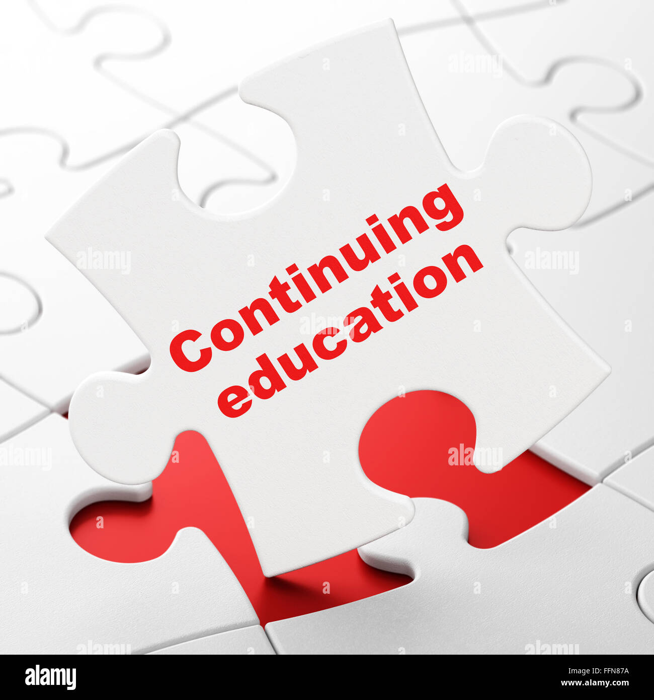 Learning concept: Continuing Education on White puzzle pieces ...