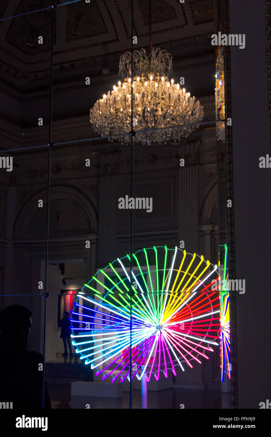 Mirrored piece of art composed of neon tubes Stock Photo - Alamy