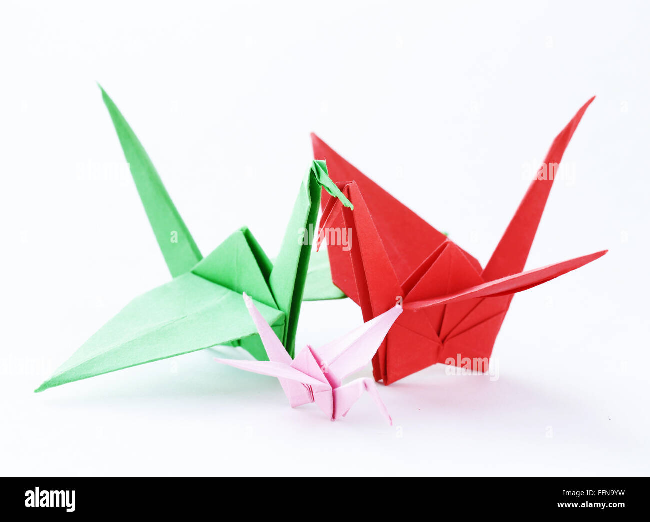 colorful paper origami birds on a white background Stock Photo - Alamy