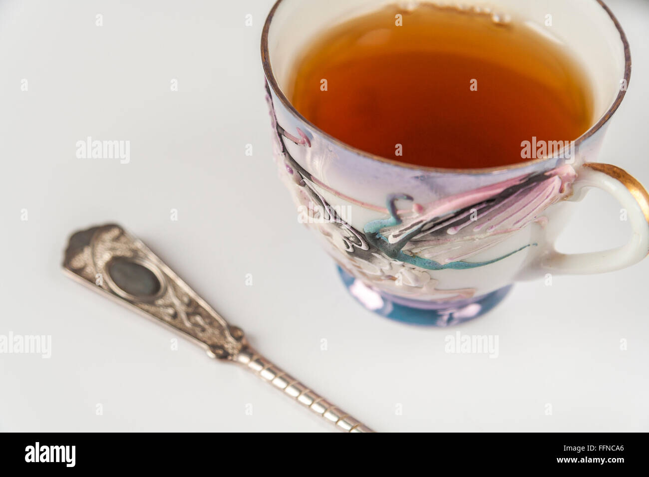 Cup of Tea and Spoon Stock Photo - Alamy