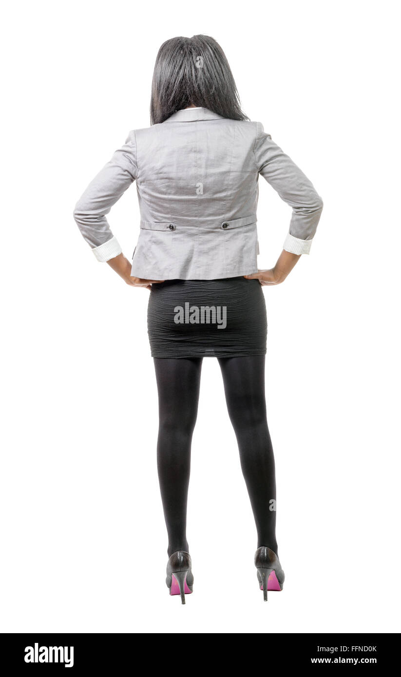 an african american businesswoman smiling, on white, back view Stock ...