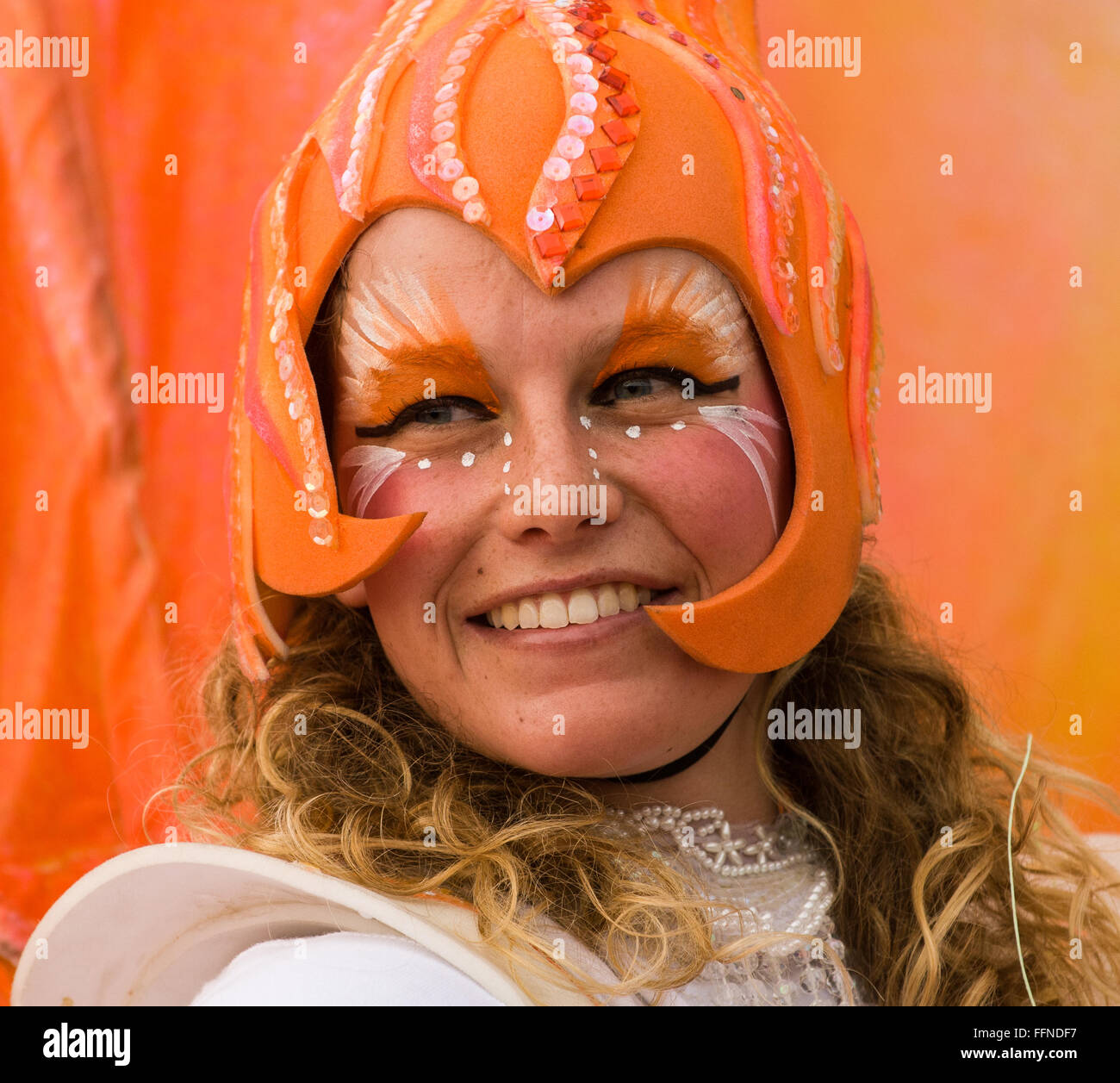 Performers dressed in elaborate colourful costumes taking part in the ...