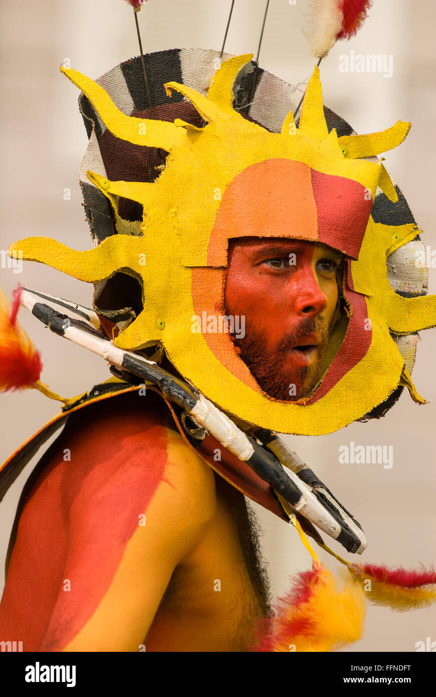 Performers dressed in elaborate colourful costumes taking part in the ...