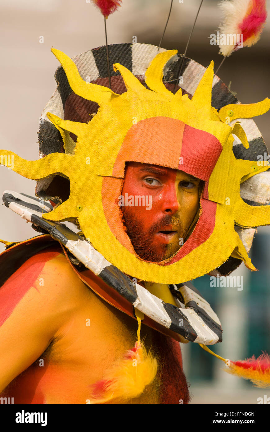 Performers dressed in elaborate colourful costumes taking part in the ...