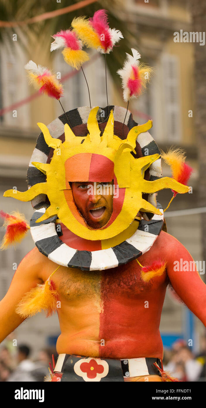 Performers dressed in elaborate colourful costumes taking part in the ...