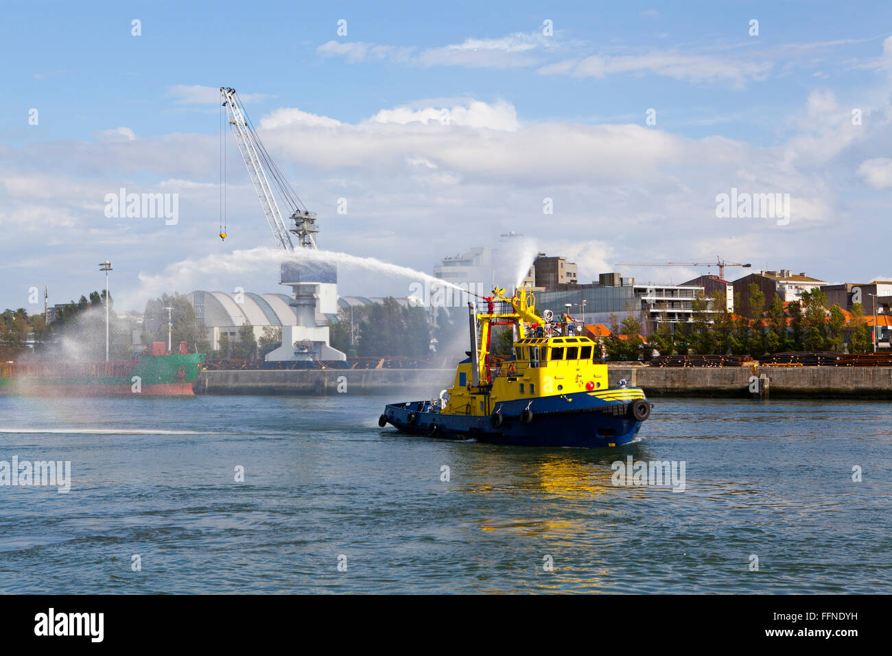 Commercial Dock with a Tugboat Stock Photo - Alamy