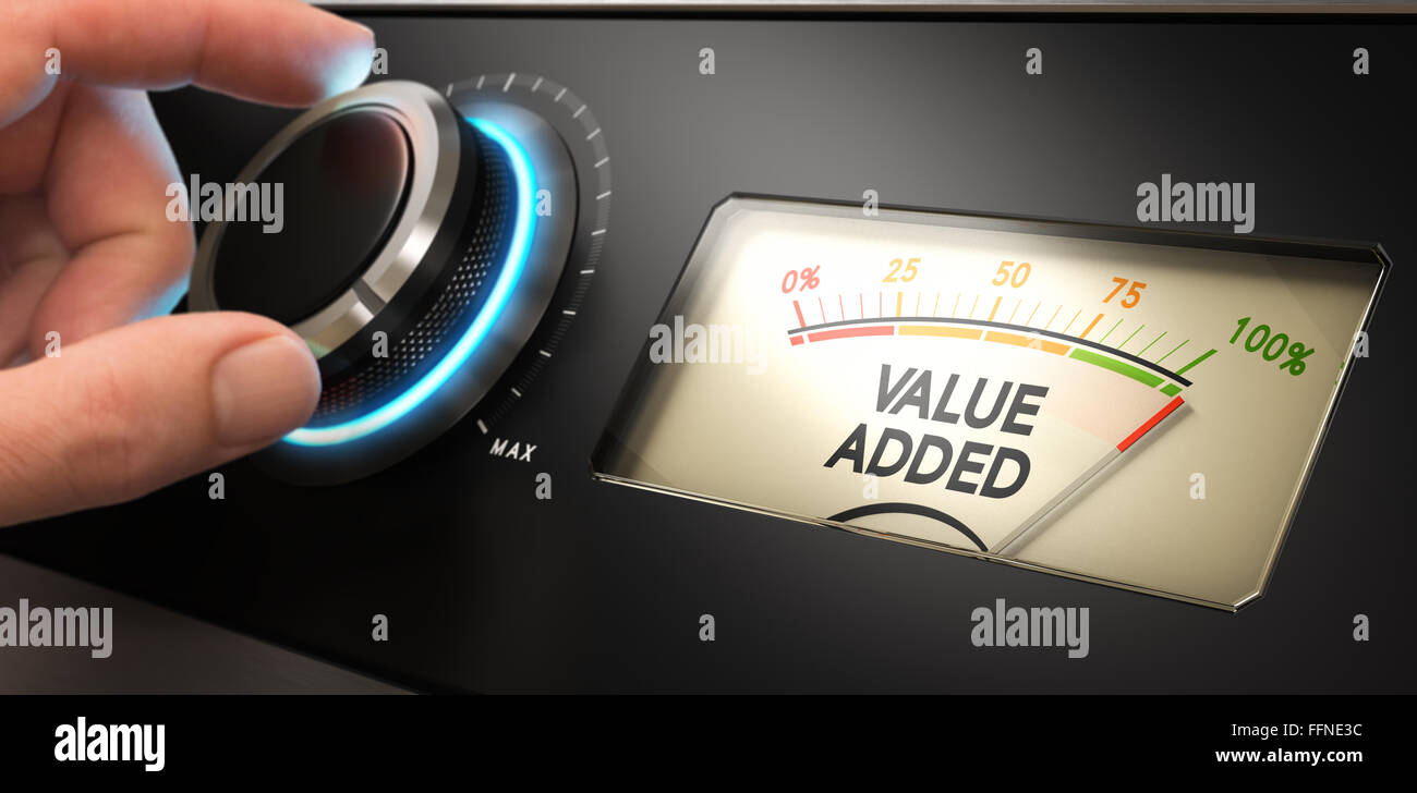 Hand turning a knob up to the maximum with a dial where it is written ...