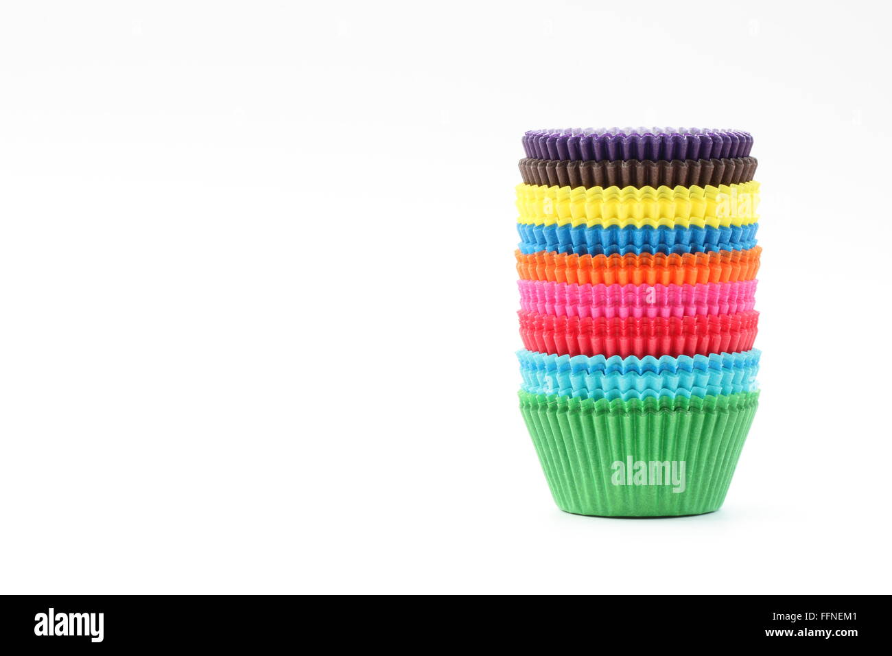A stack of colorful baking cases on an isolated white background Stock ...