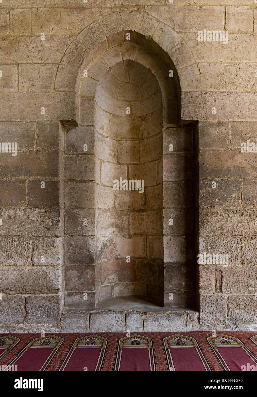 A stone wall with embedded niche in a historic mosque, Cairo, Egypt ...