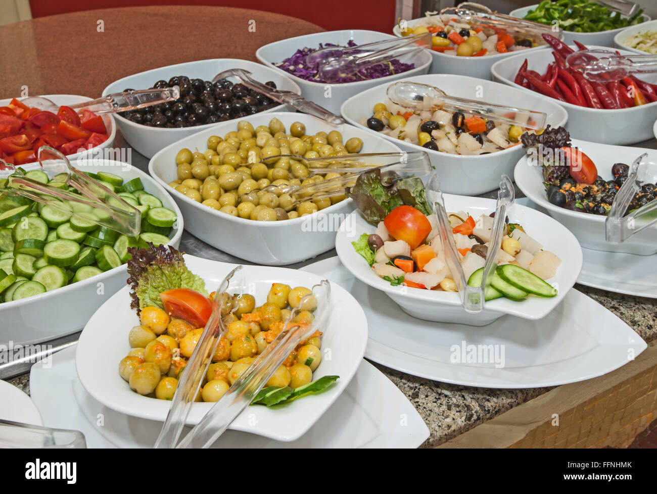 Selection display of salads at a luxury restaurant buffet bar area ...