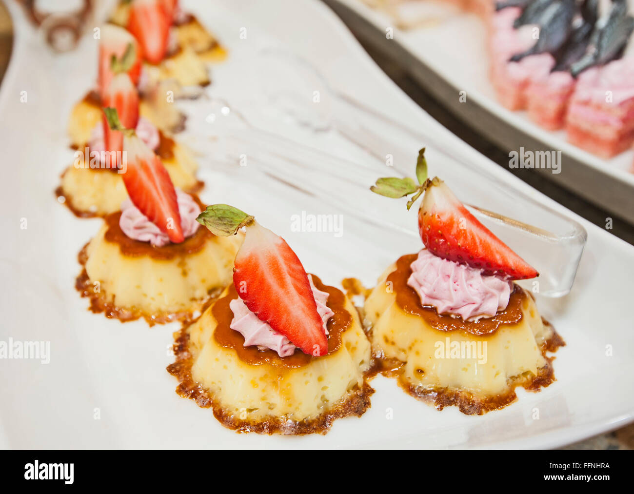 Selection of sweet desserts on display at a luxury restaurant buffet ...