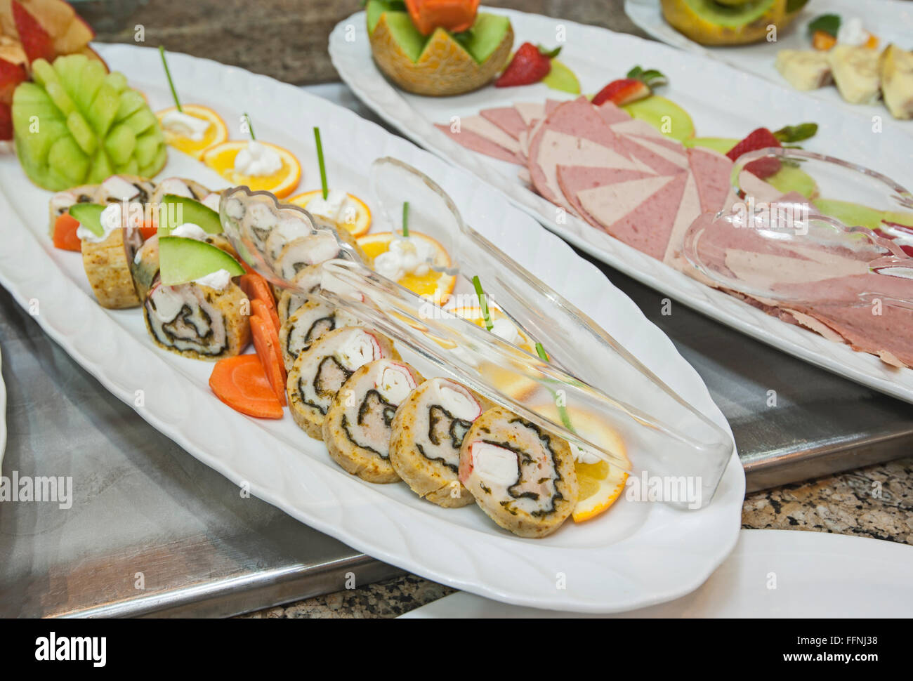 Selection of cold appetizers on display at a luxury restaurant buffet ...