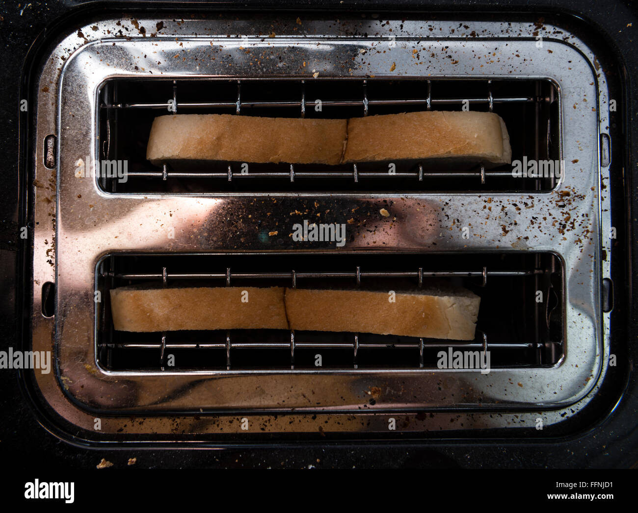 Toast Bread in a toaster (detailed close-up shot Stock Photo - Alamy