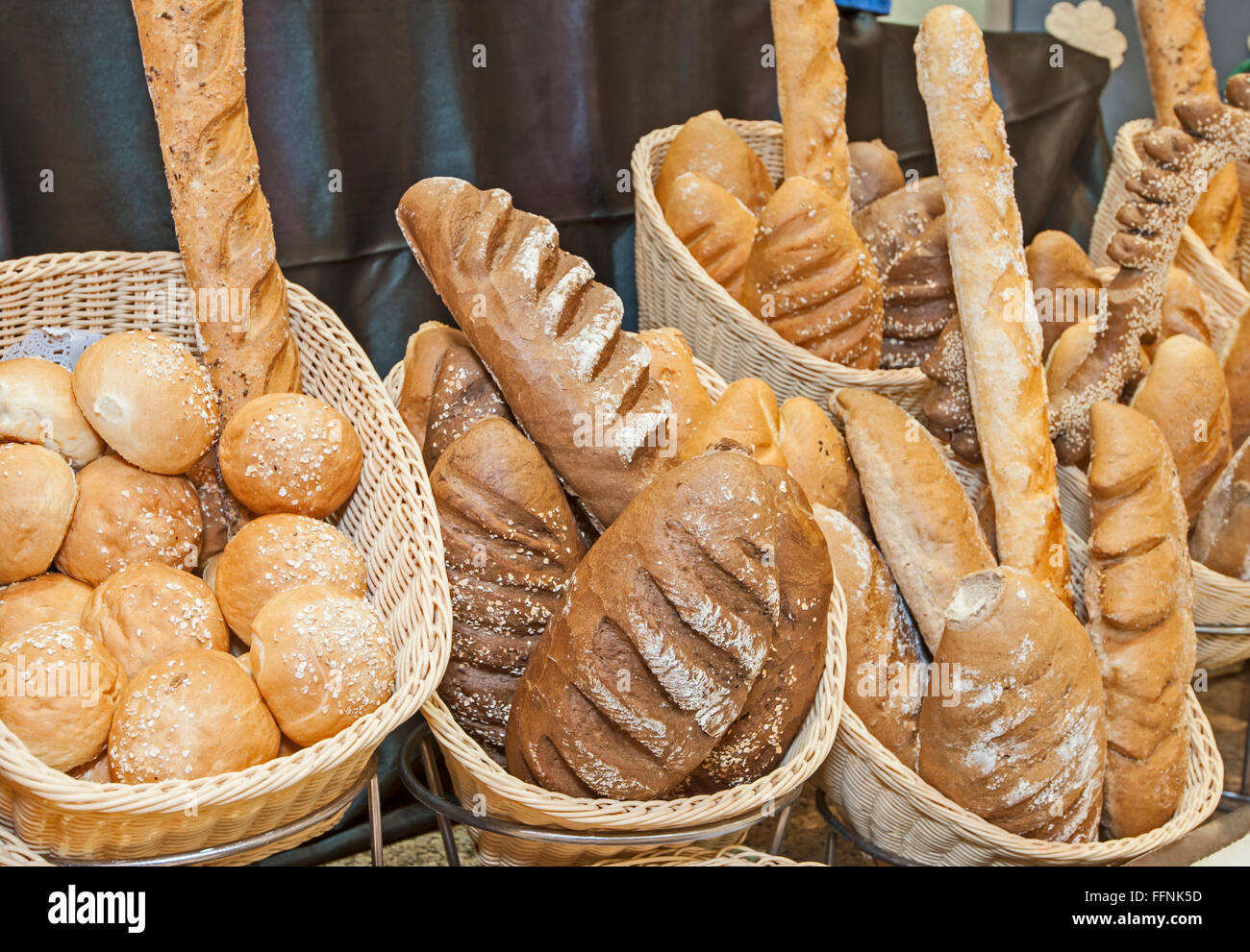 Selection of ornate bread loaves on display at a luxury restaurant ...