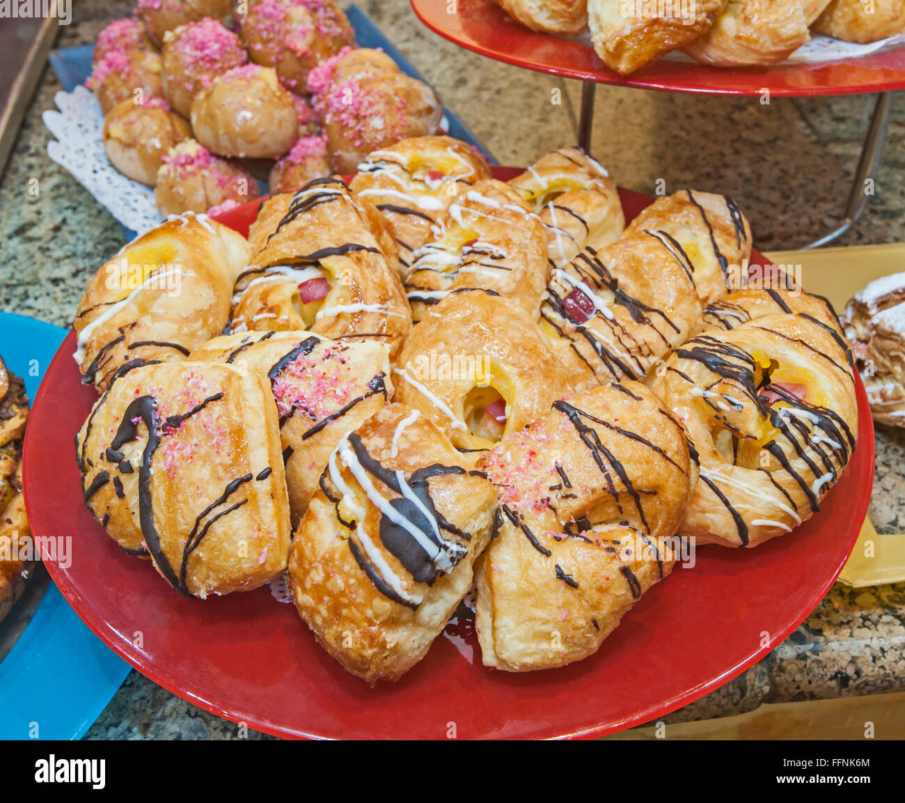 Selection of sweet dessert danish pastries on display at a luxury ...