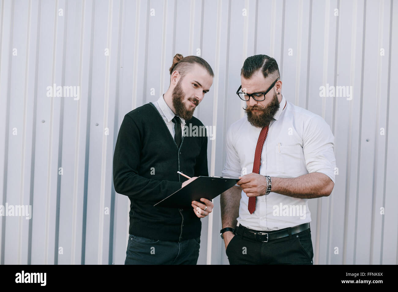 business man checking objects in glasses shirt Stock Photo - Alamy