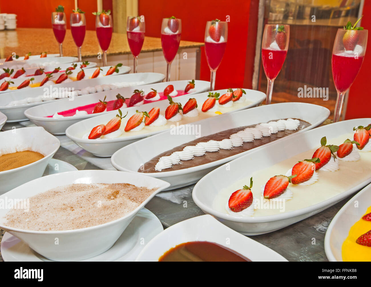 Selection of sweet desserts on display at a luxury restaurant buffet ...