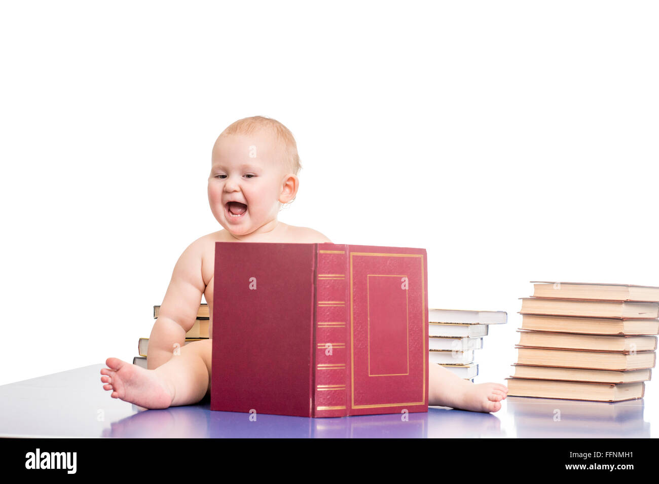 Toddler sitting reading book hi-res stock photography and images - Alamy