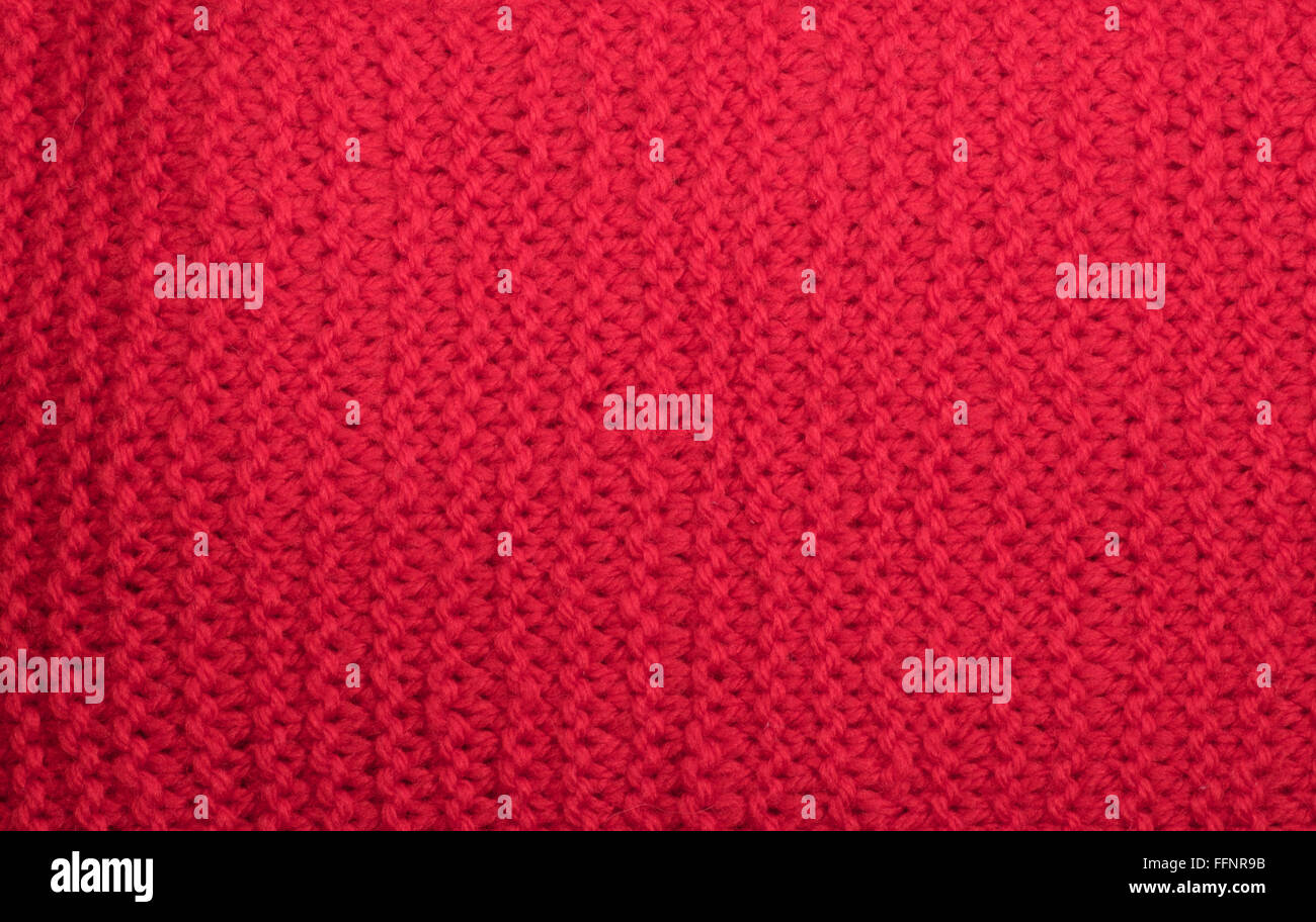 Red knitted background close hi-res stock photography and images - Alamy