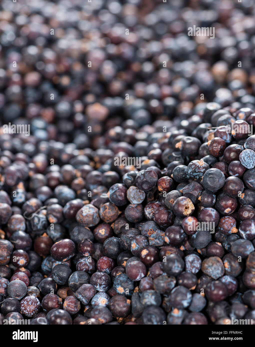 Heap of dried Juniper Berries for use as background image (close-up ...